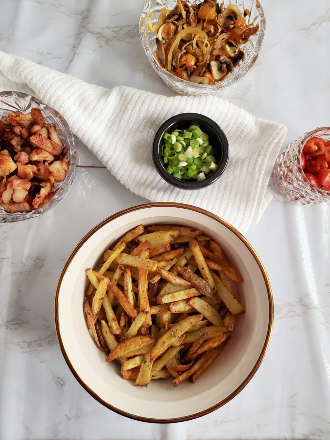 Breakfast Poutine with Homemade Hollandaise Sauce - Your Wandering Foodie