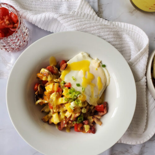 Breakfast Poutine with Homemade Hollandaise Sauce - Your Wandering Foodie