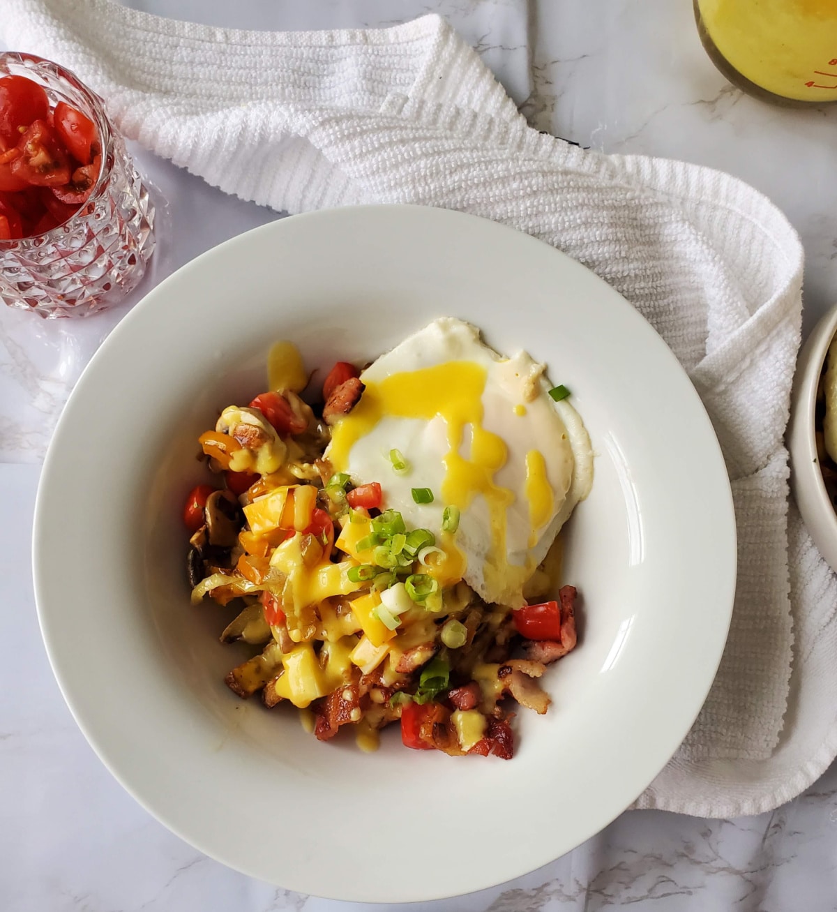 Breakfast Poutine with Homemade Hollandaise Sauce - Your Wandering Foodie