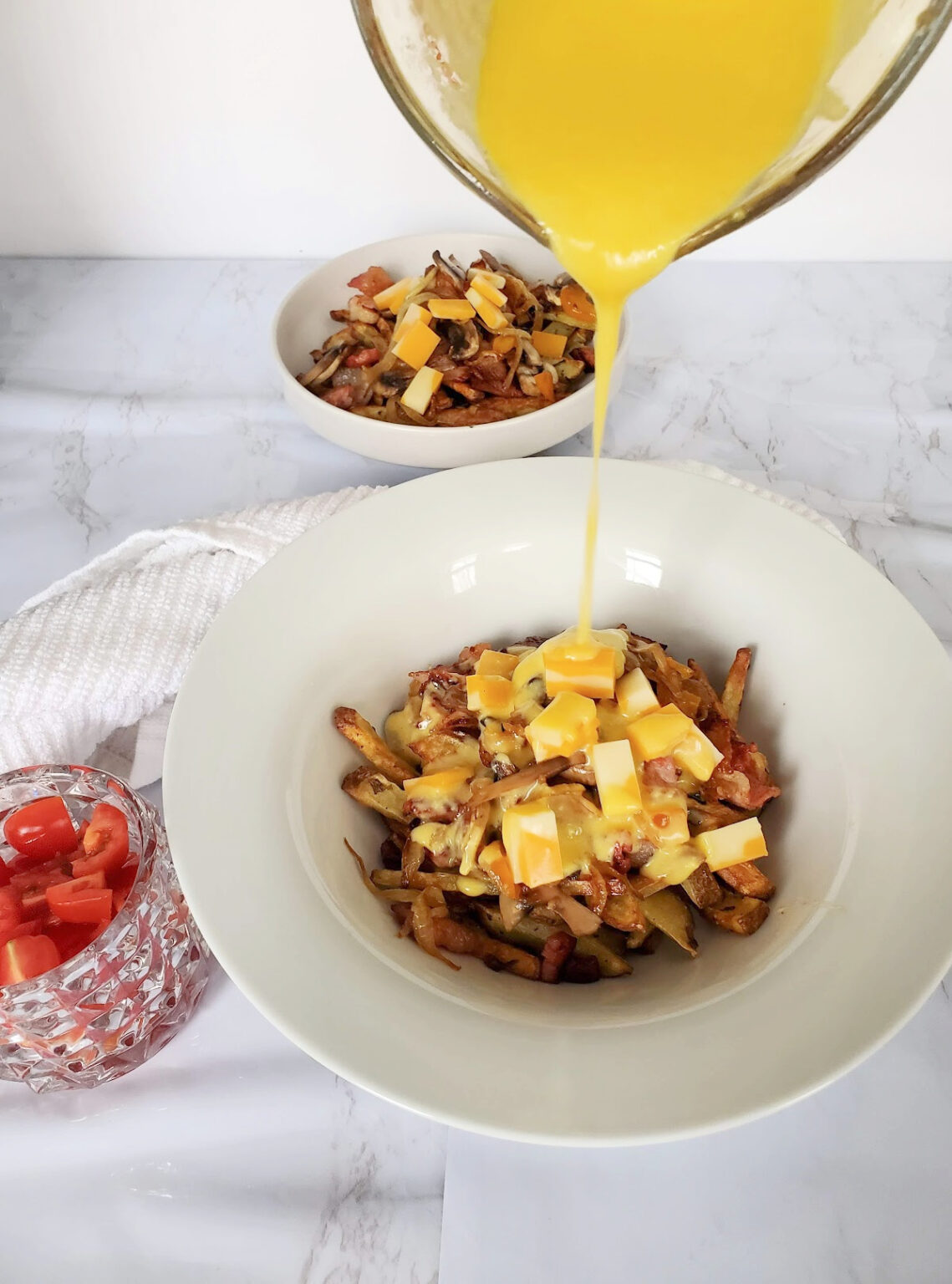 Breakfast Poutine with Homemade Hollandaise Sauce - Your Wandering Foodie